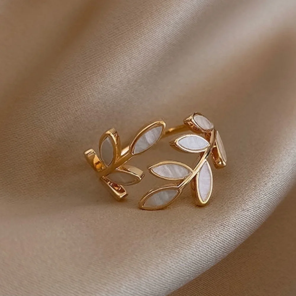 The Secret Pine | Jewelry | Besiana Gold X White Leaf Design Fashion ...
